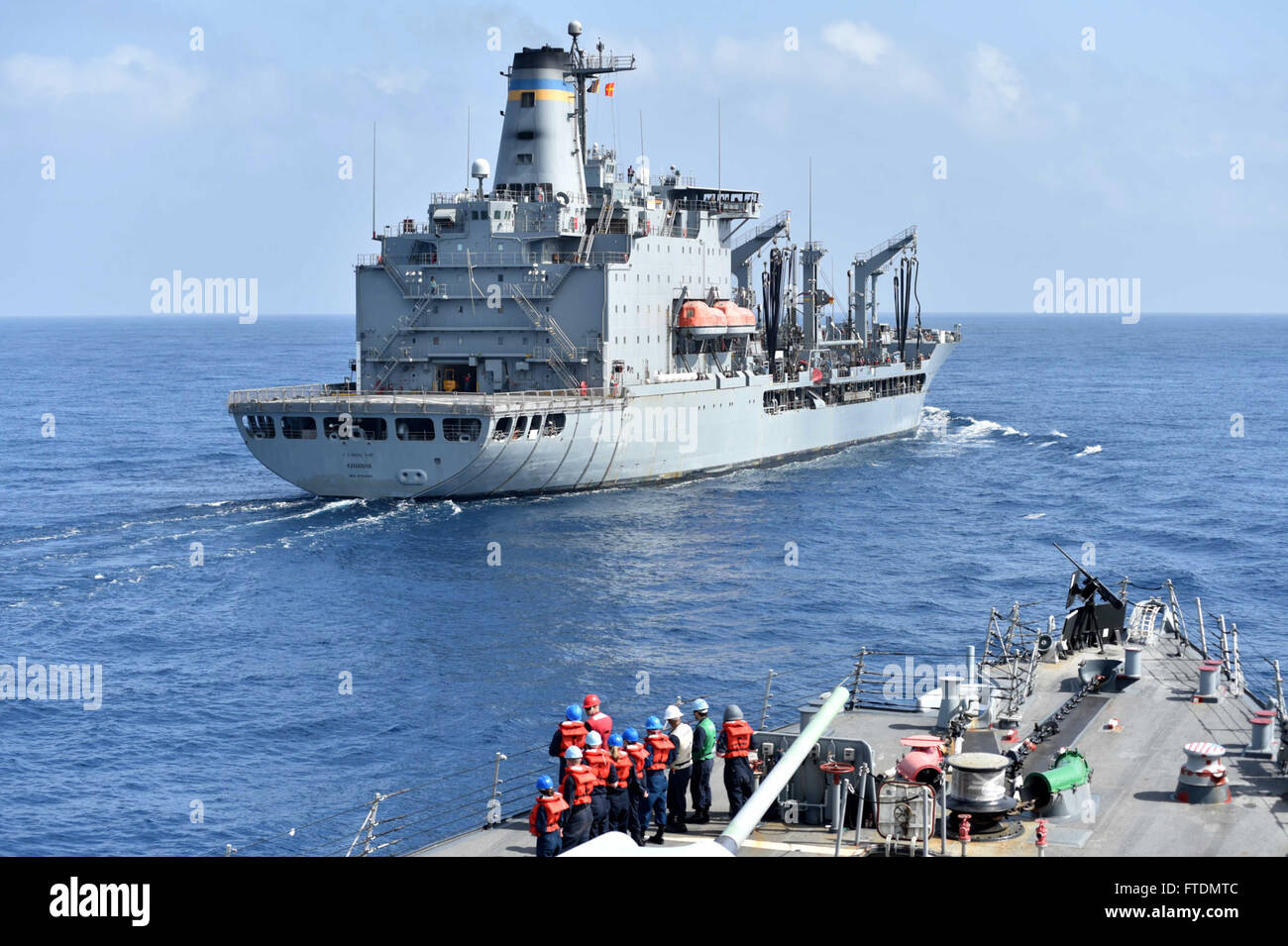This photograph shows the USS Ross (DDG 71), an Arleigh Burke-class ...