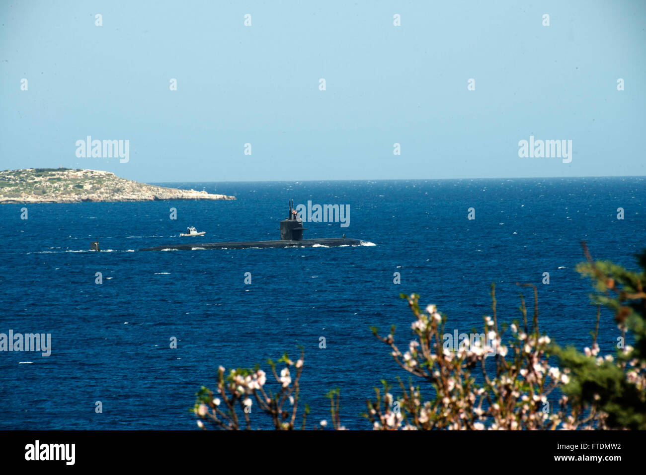 This U.S. Navy photo captures the USS Newport News (SSN-750), a Los ...