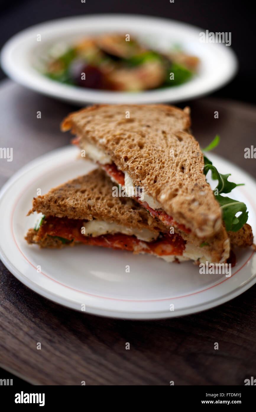 Italian salami and sheep cheese sandwich with brown bread Stock Photo ...