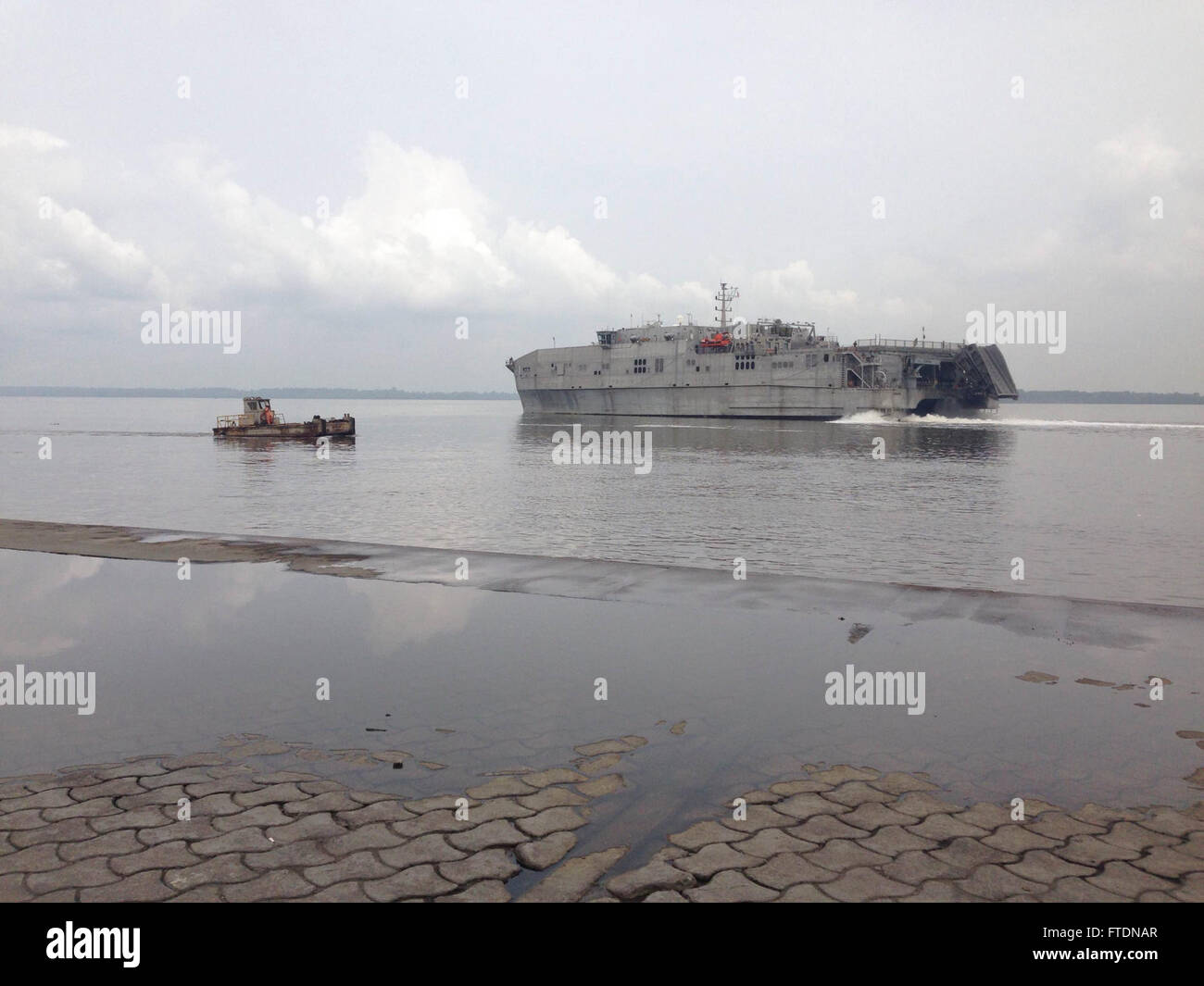 The USNS Spearhead (T-EPF 1) departs Douala, Cameroon, as part of its ...