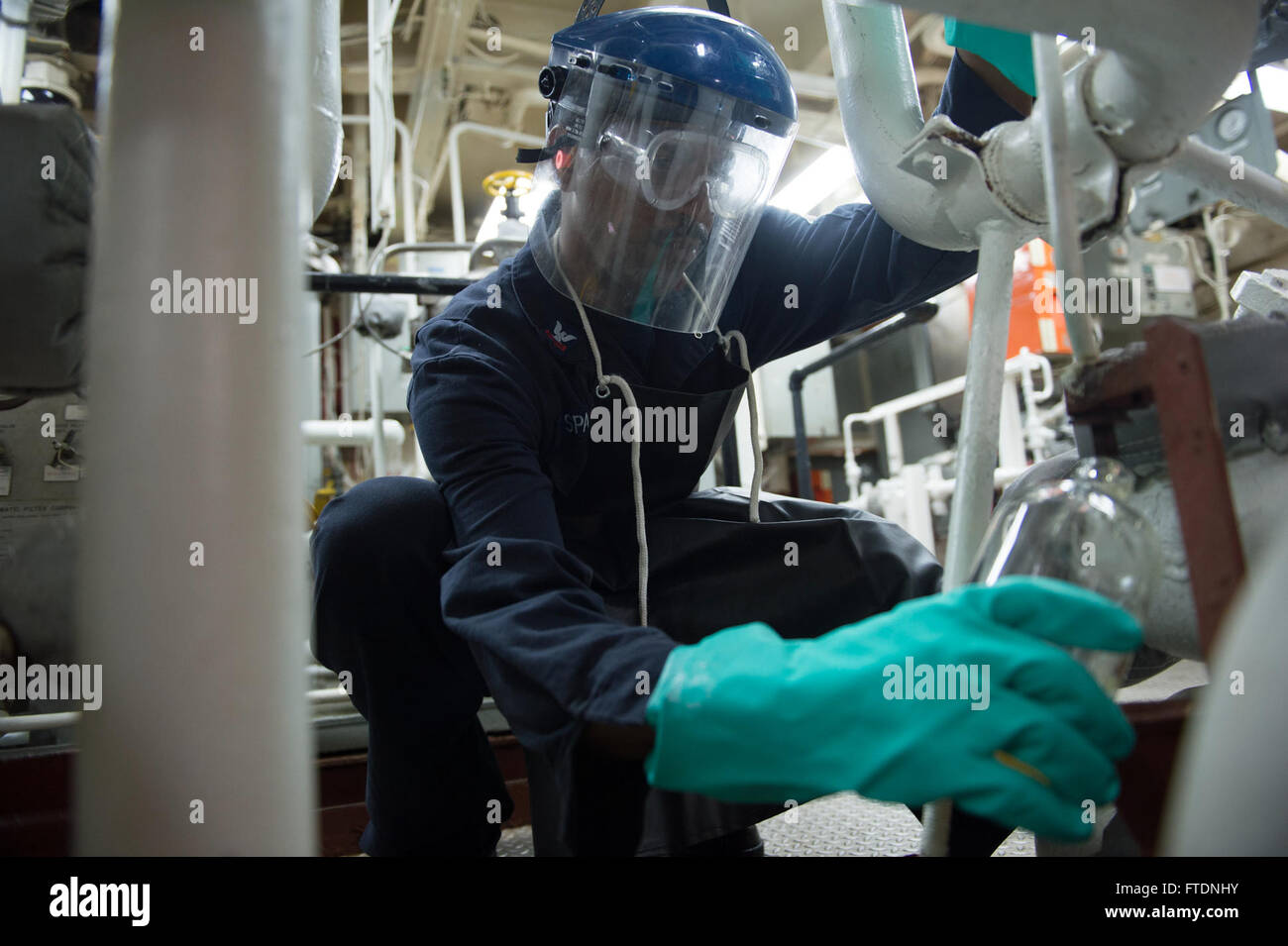 Gas Turbine Systems Technician 1st Class Fred Spaulding conducts a fuel ...