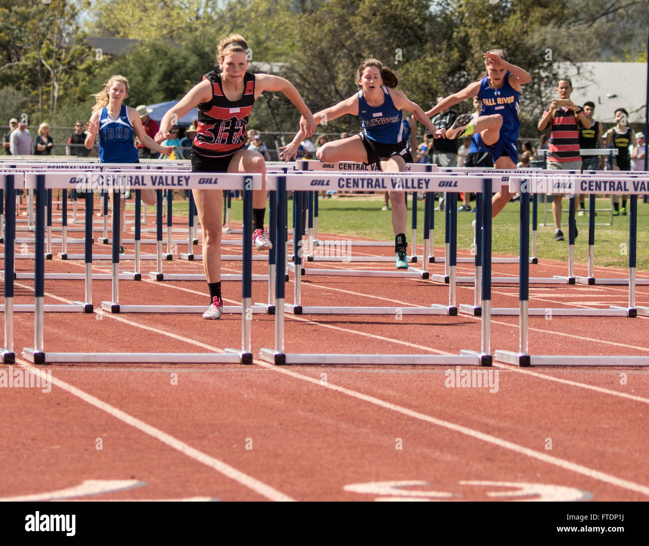 Low hurdles race at the Burt Williams Track and Field Classic. City of ...