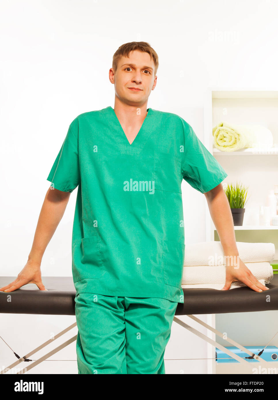 Young masseur hi-res stock photography and images - Alamy