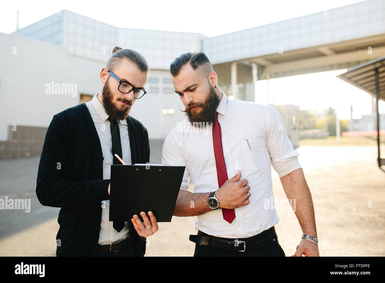 Two businessman at work Stock Photo - Alamy
