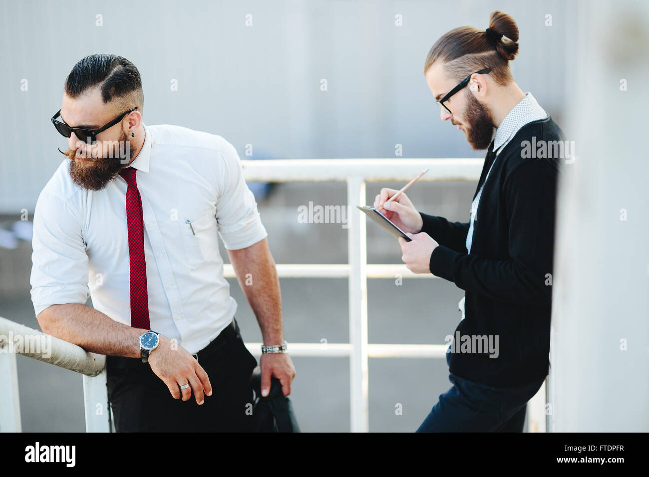Two businessman at work Stock Photo - Alamy