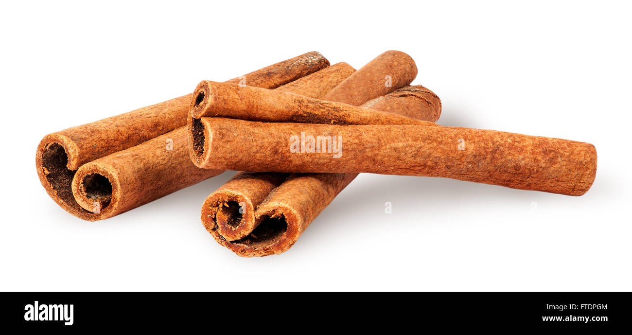 Three cinnamon sticks lying cross isolated on white background Stock ...