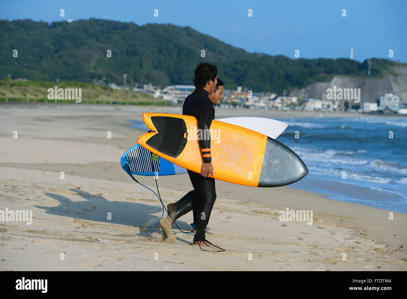 Japanese surfers on the beach Stock Photo - Alamy