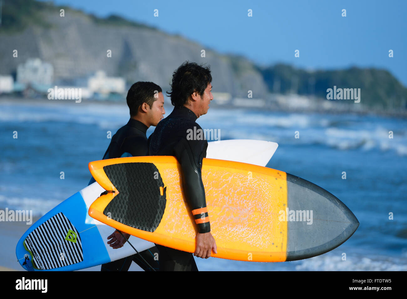Japanese surfers on the beach Stock Photo - Alamy