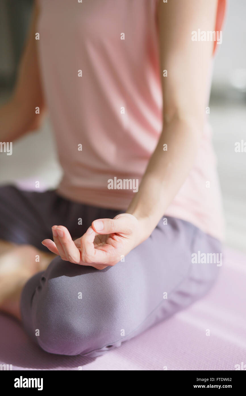 Young Japanese woman practicing yoga Stock Photo - Alamy