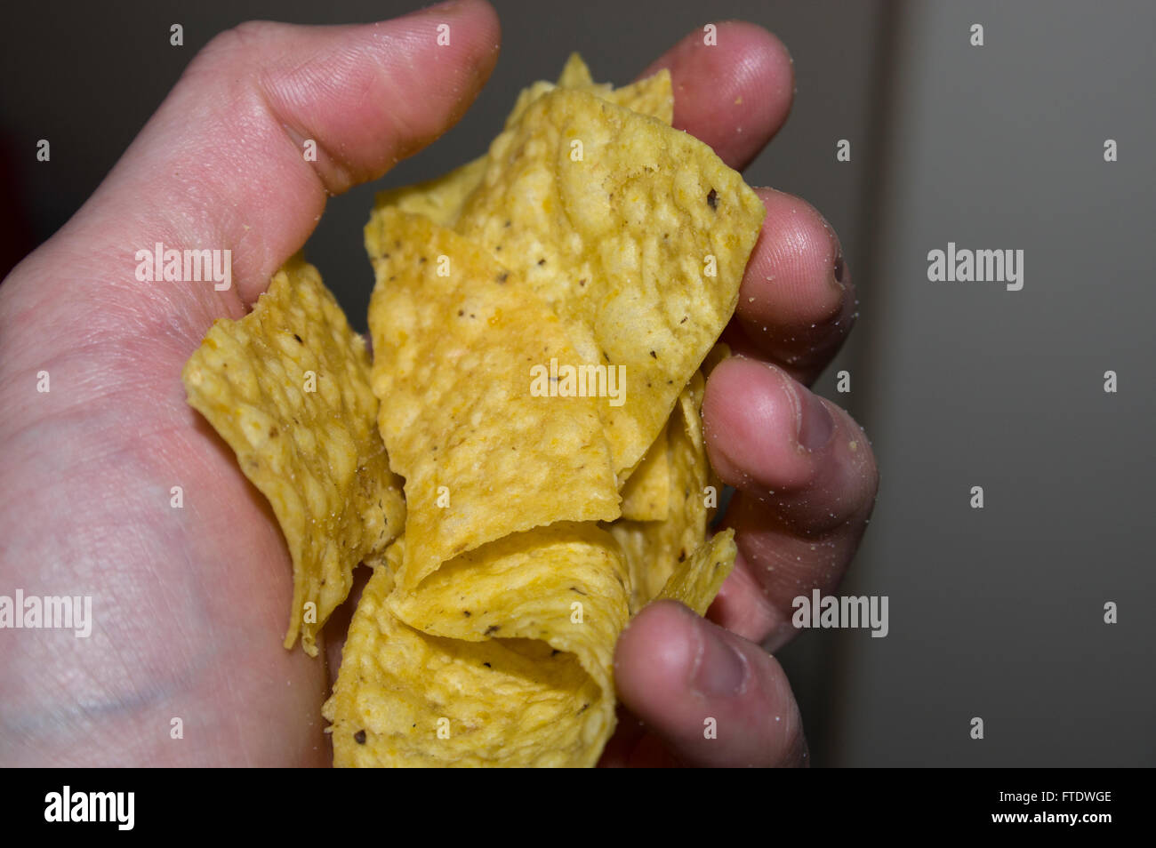 corn chips,Mexican , hand, chips Stock Photo - Alamy