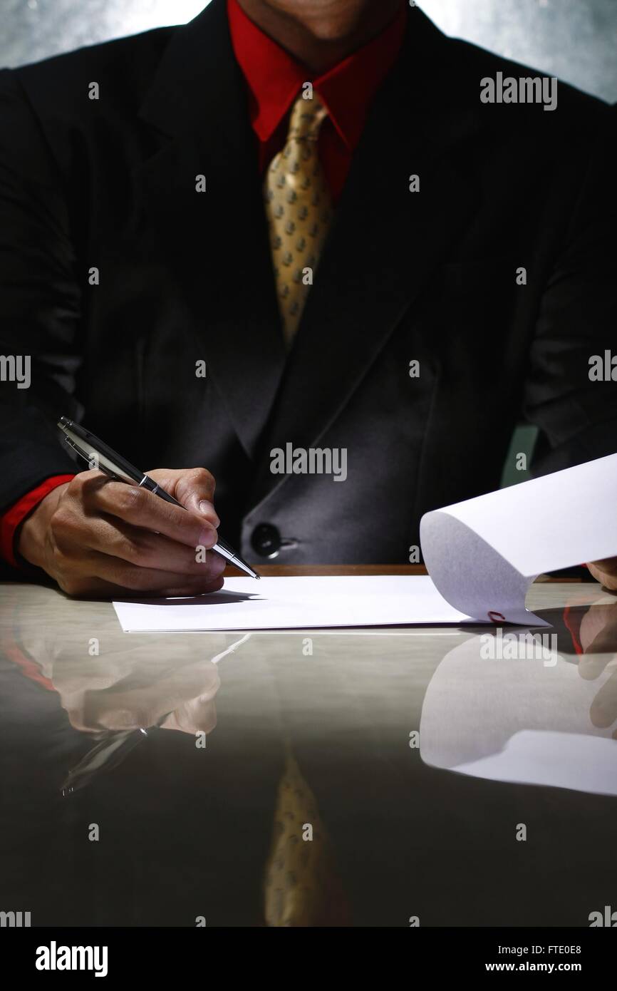 Male hand turning page signing hi-res stock photography and images - Alamy