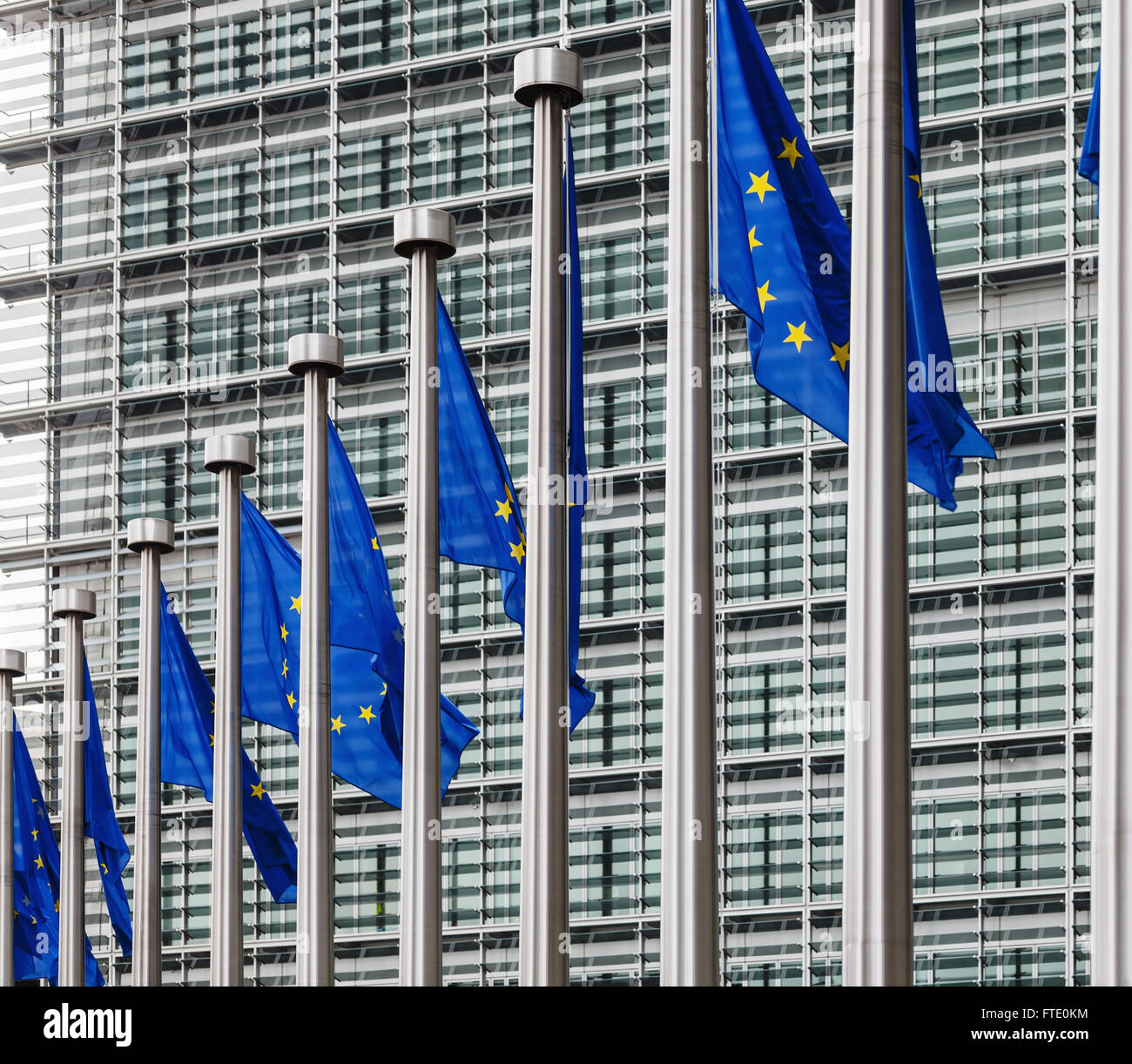 Flags of European Union in front of European Commission building in ...
