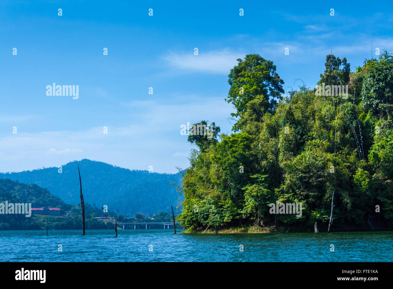 Tropical lake and islands in clear blue sky. Belum resort, Banding ...