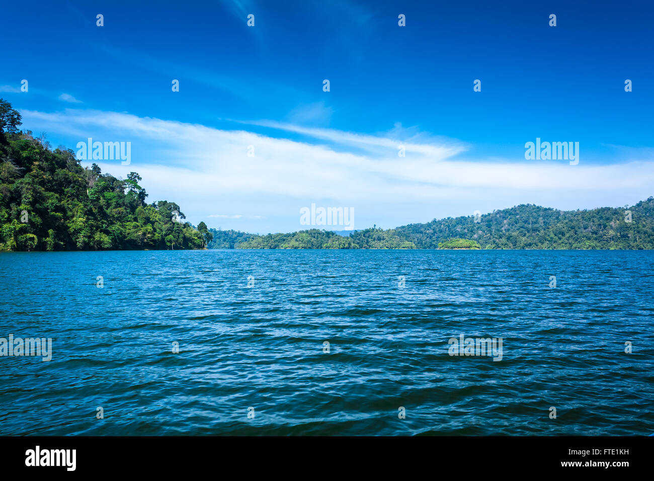 Tropical lake and islands in clear blue sky. Belum resort, Banding ...