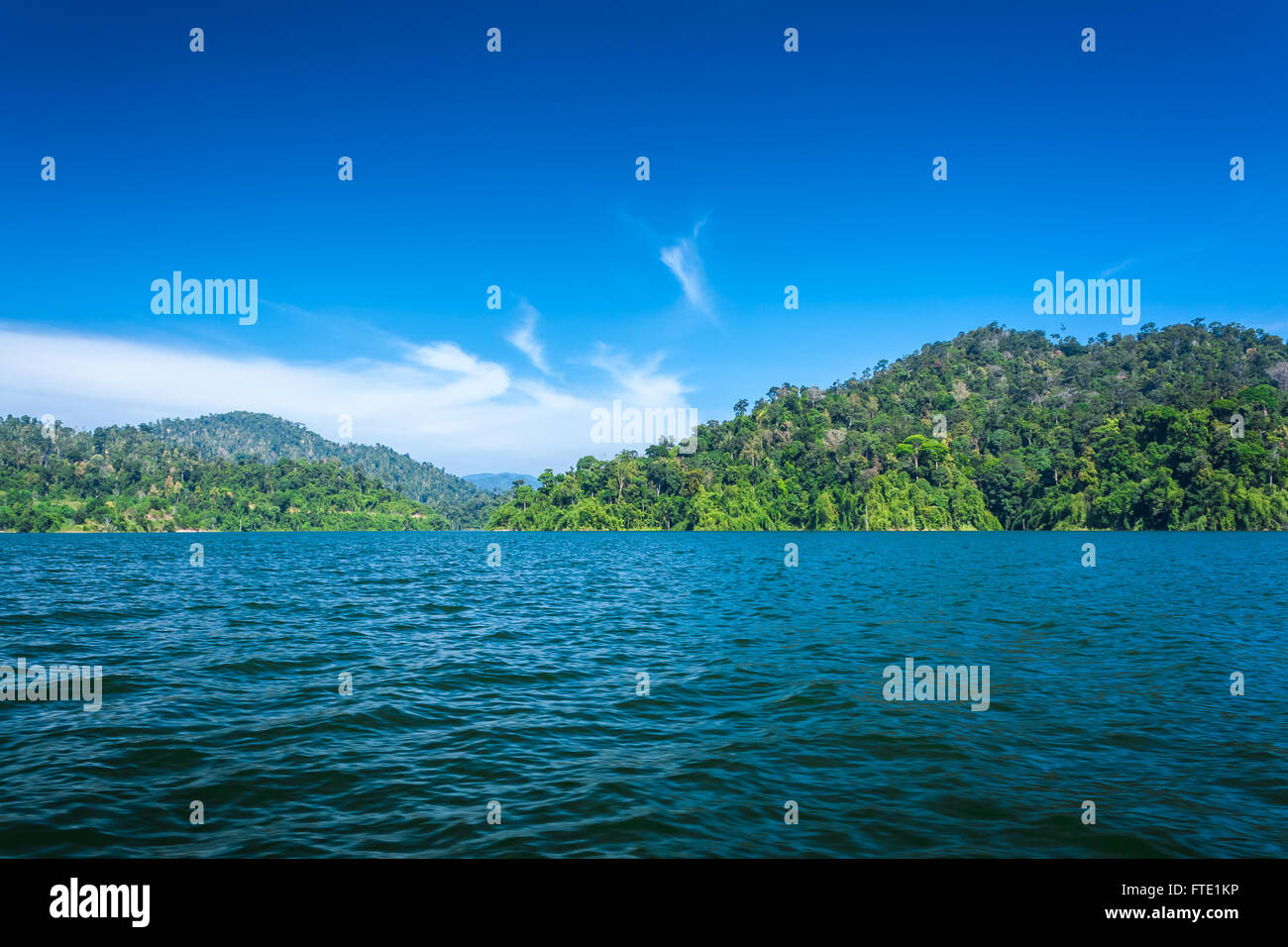 Tropical lake and islands in clear blue sky. Belum resort, Banding ...