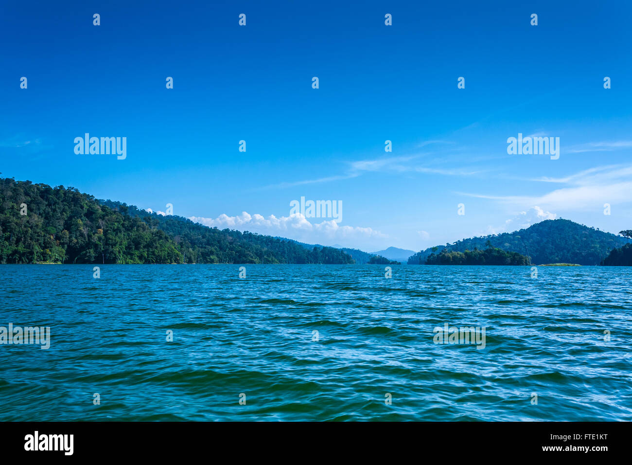 Tropical lake and islands in clear blue sky. Belum resort, Banding ...