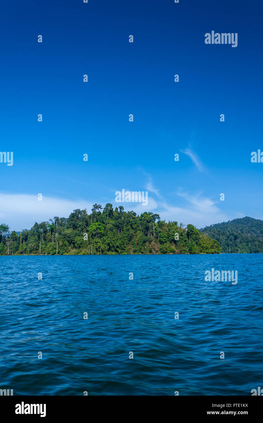 Tropical lake and islands in clear blue sky. Belum resort, Banding ...