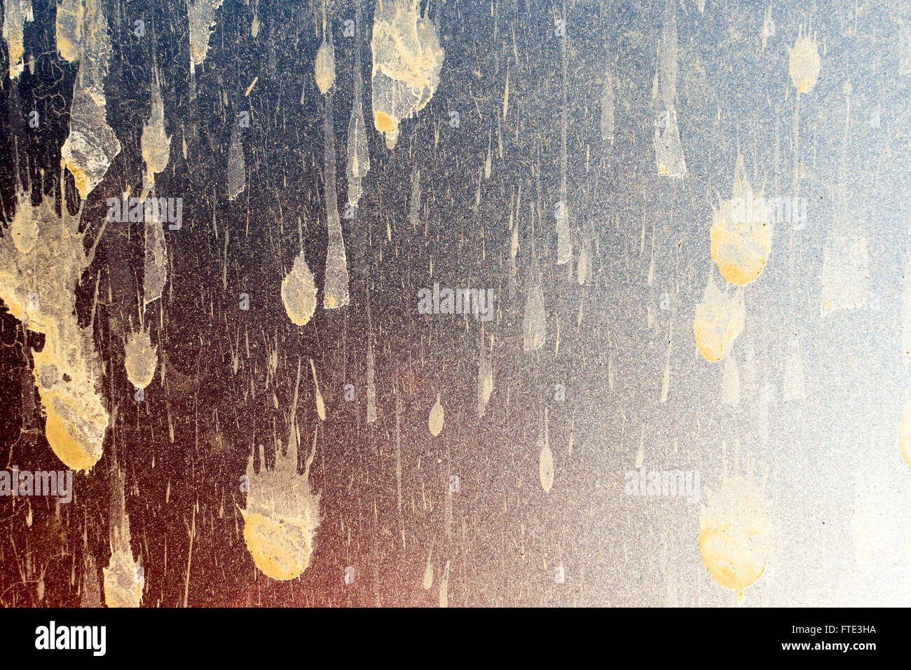Dirty mud splashes make dynamic abstract trailing patterns as they dry ...