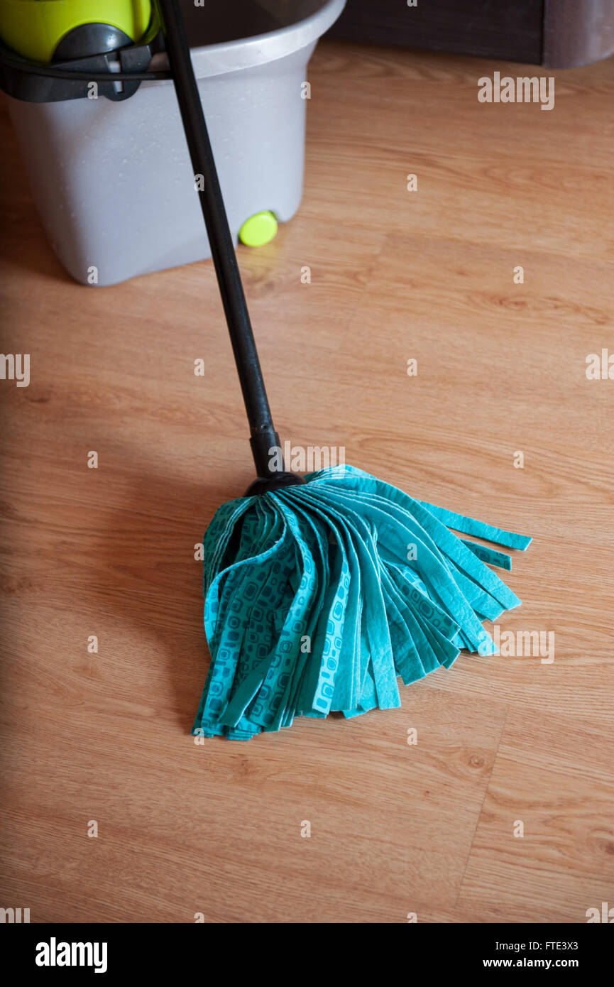 Mop with a bucket Stock Photo - Alamy