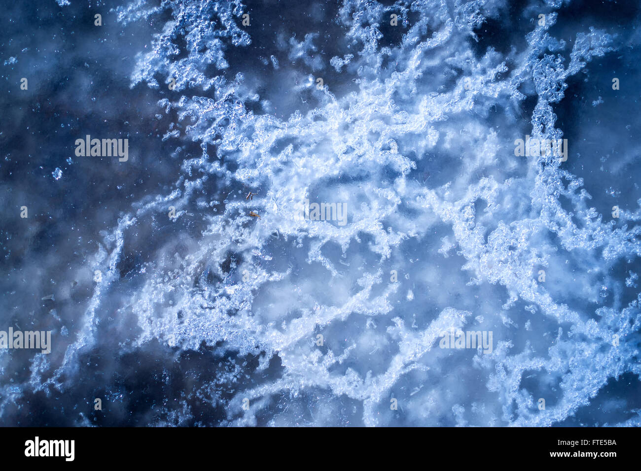 Frozen ice patterns nature background abstract with shapes and textures ...