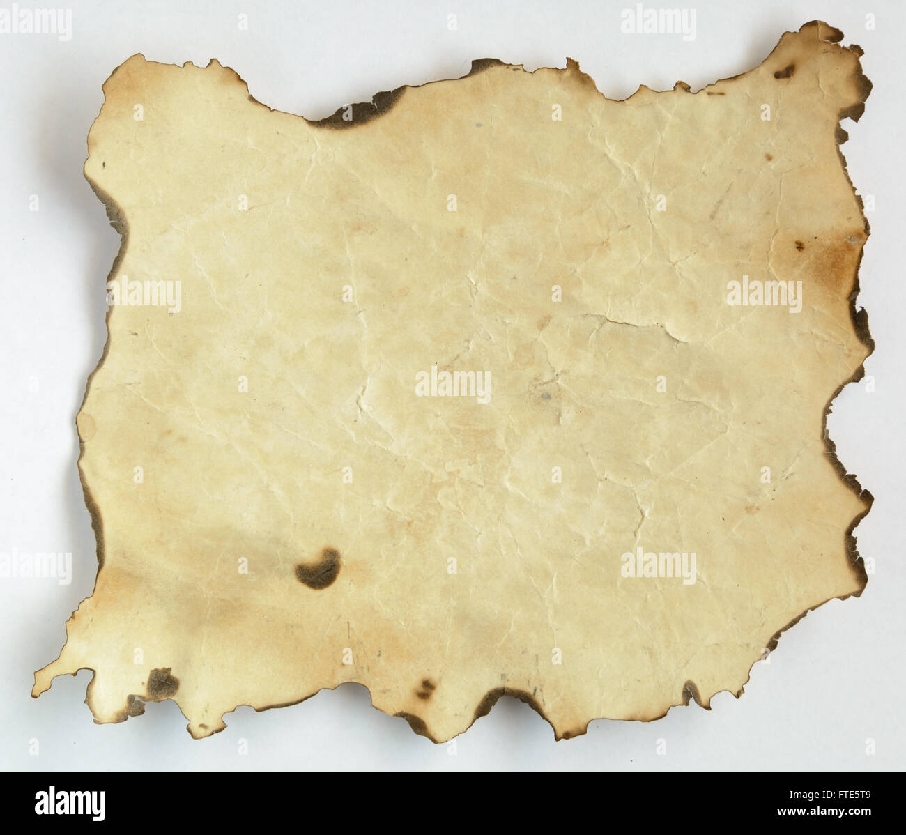 Burnt old paper background Stock Photo - Alamy