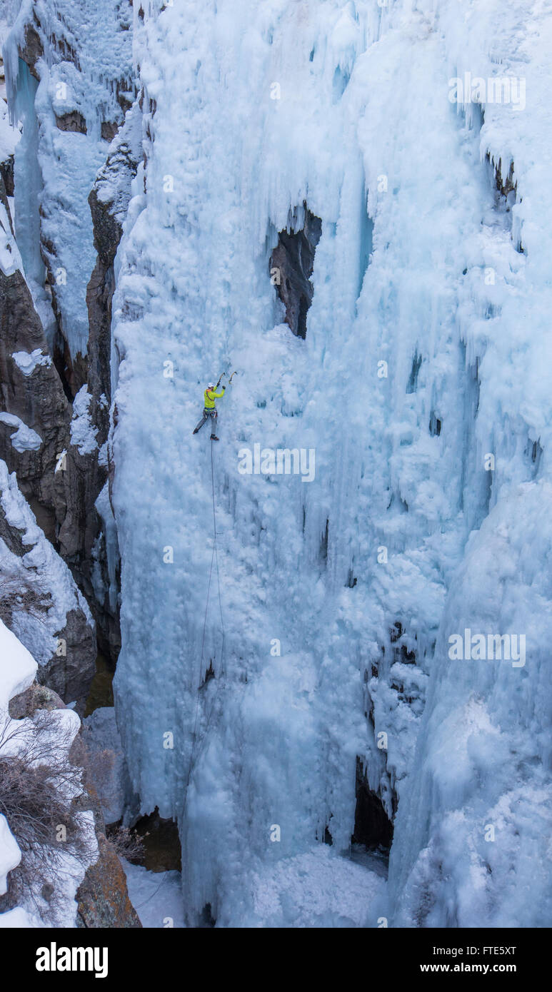 Ice climber climbing a route called Pick o' Vic which is rated WI4 in ...
