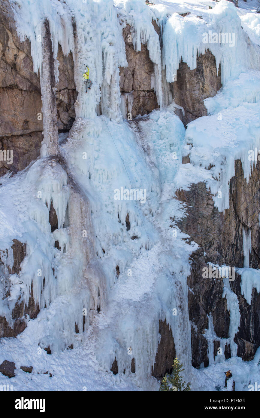 Ice climber climbs a route called "In the Pink" rated WI5 in Ouray ...