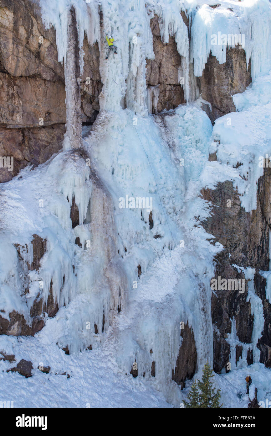 Ice climber climbs a route called "In the Pink" rated WI5 in Ouray ...