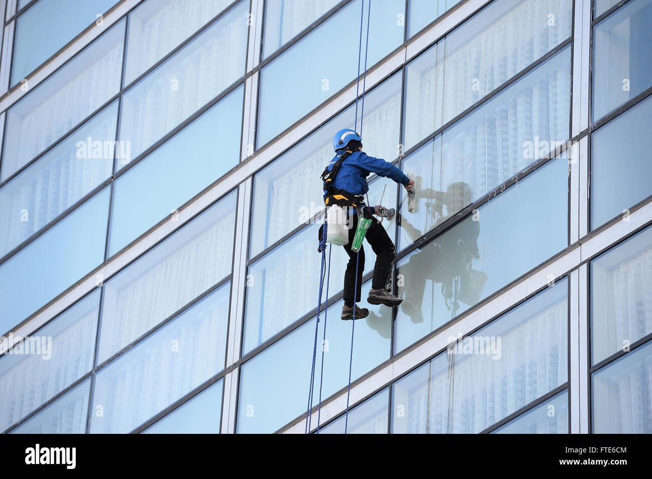 Abseiling window cleaners, clean the windows at the Lowry Hotel ...