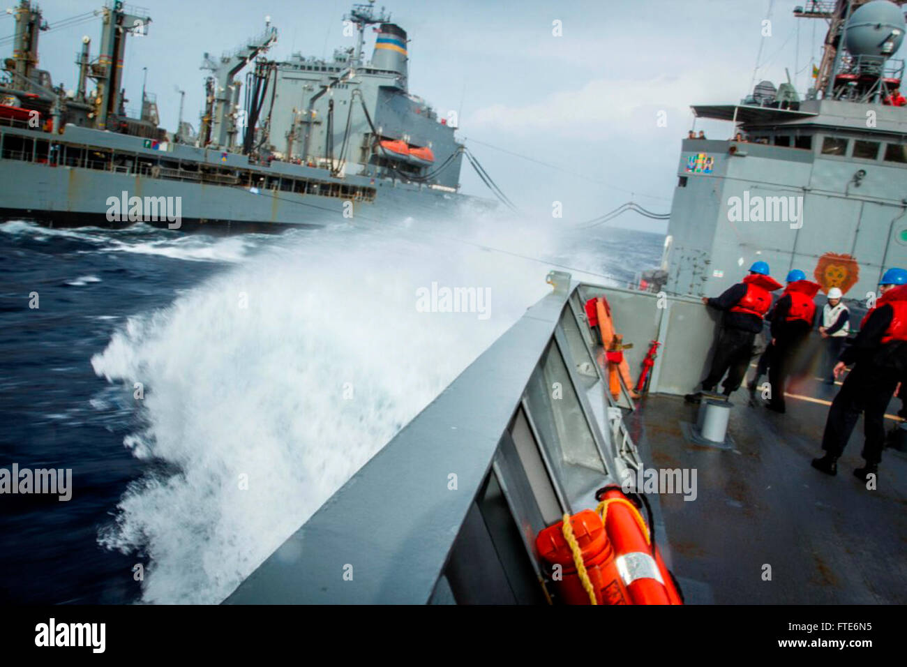Sailors aboard the USS Samuel B. Roberts (FFG 58) participate in a ...