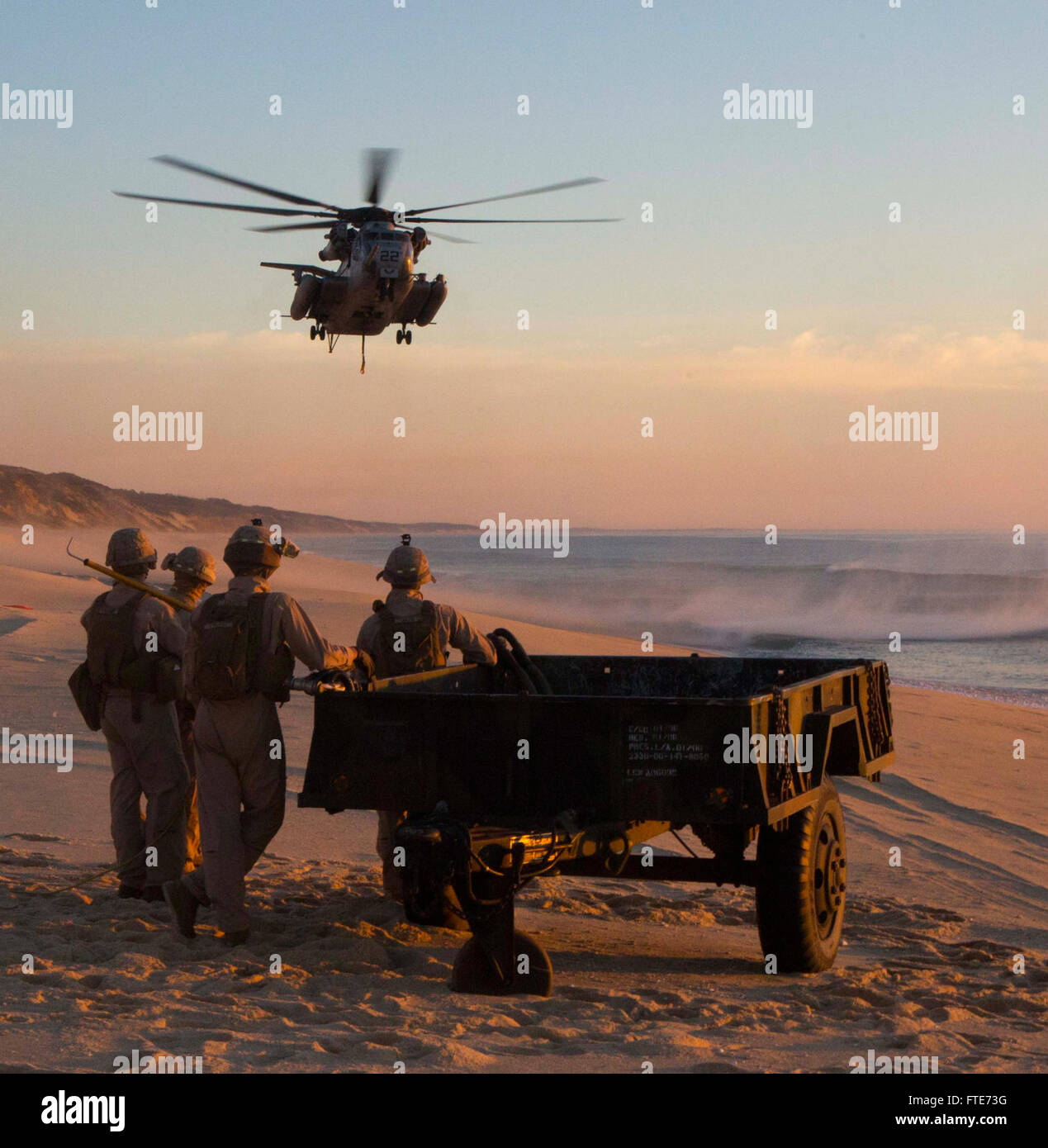 This image shows U.S. Marines of the Helicopter Support Team and ...