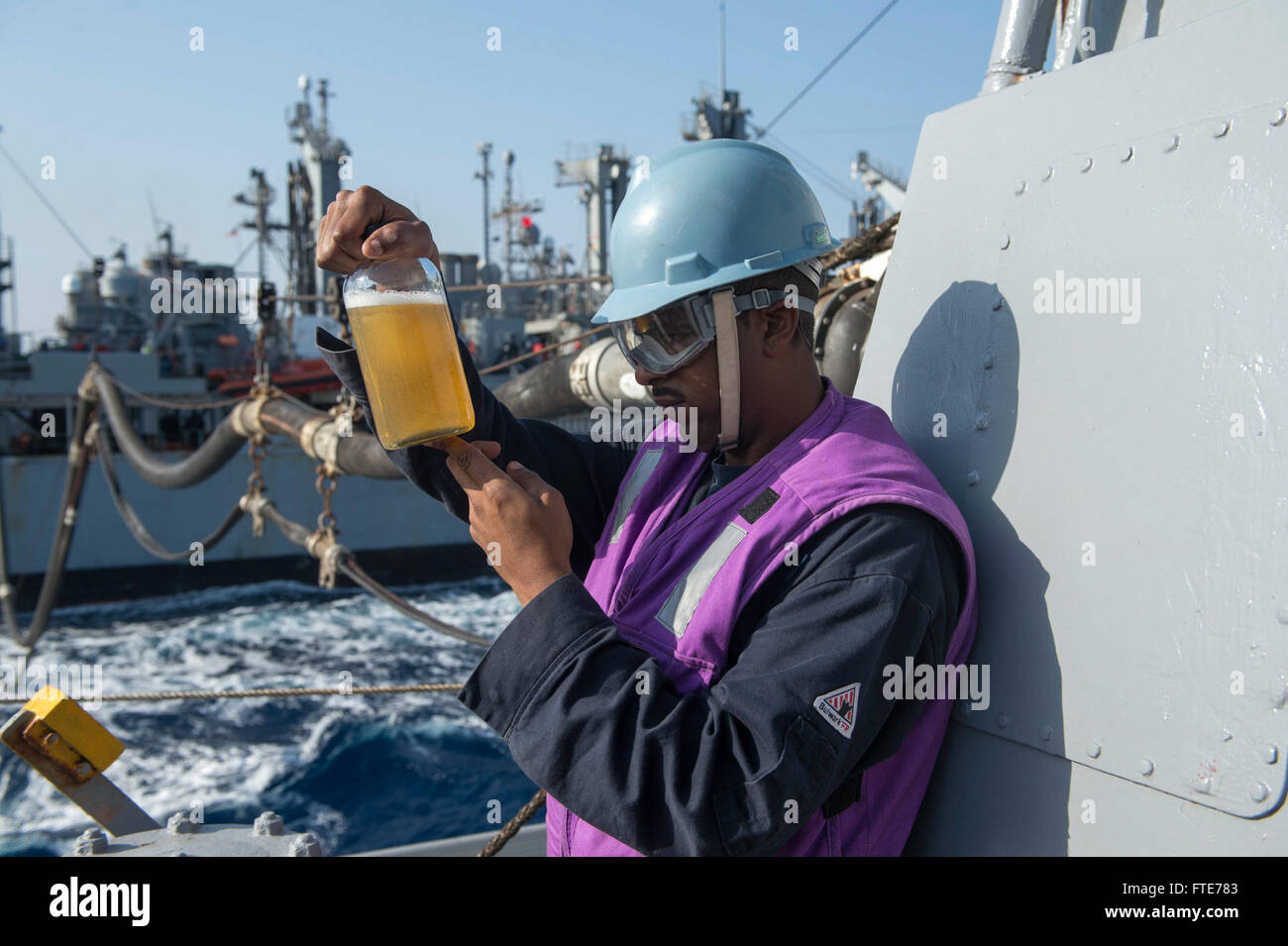 Gas Turbine Systems Technician 1st Class Fred Spaulding inspects a fuel ...