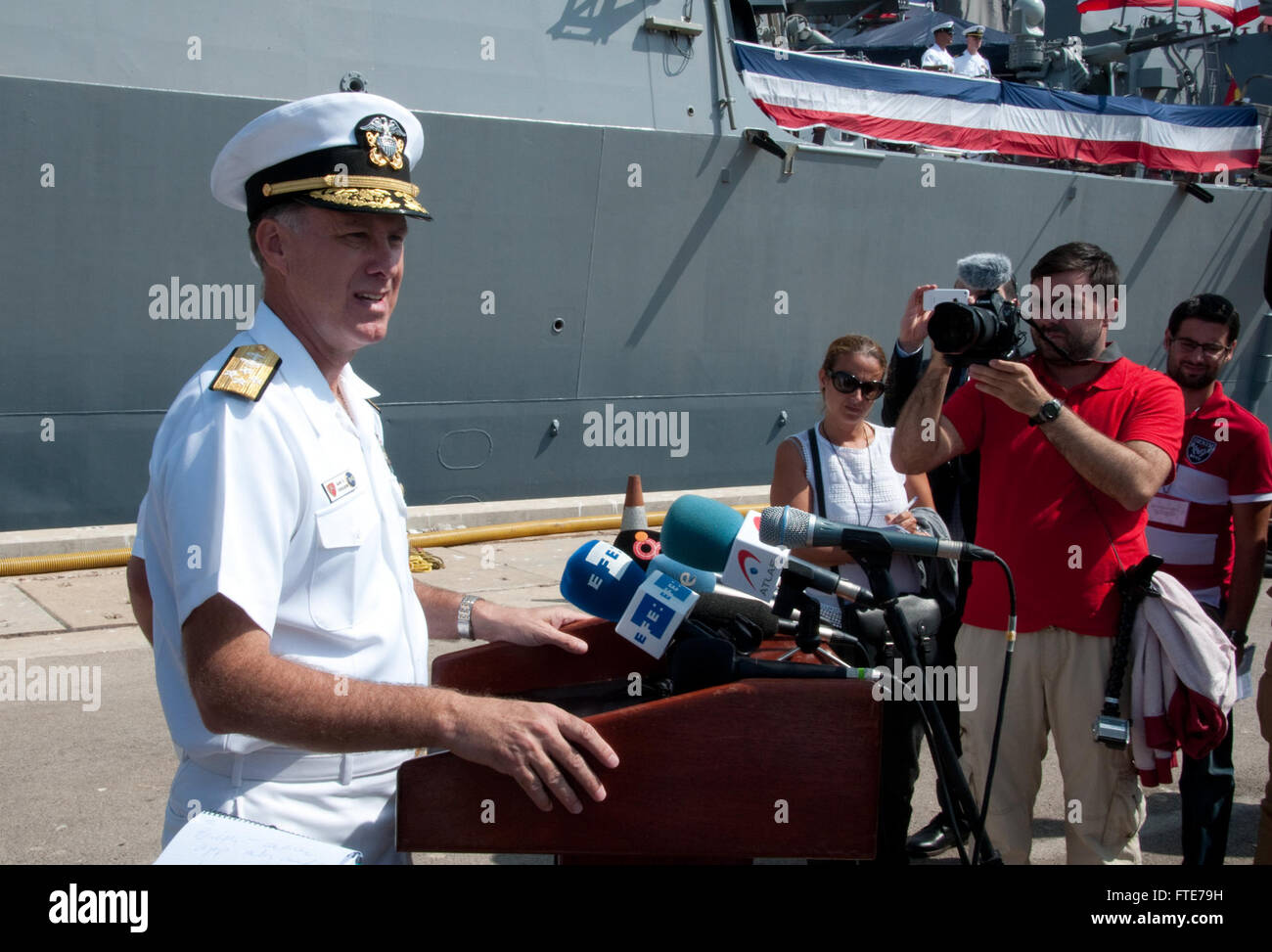 Adm. Mark Ferguson speaks to the press following the arrival of USS ...