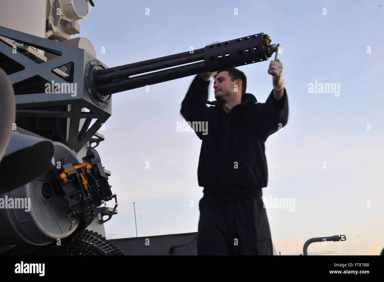 On February 25, 2014, Fire Controlman 2nd Class Patrick Kent works on ...