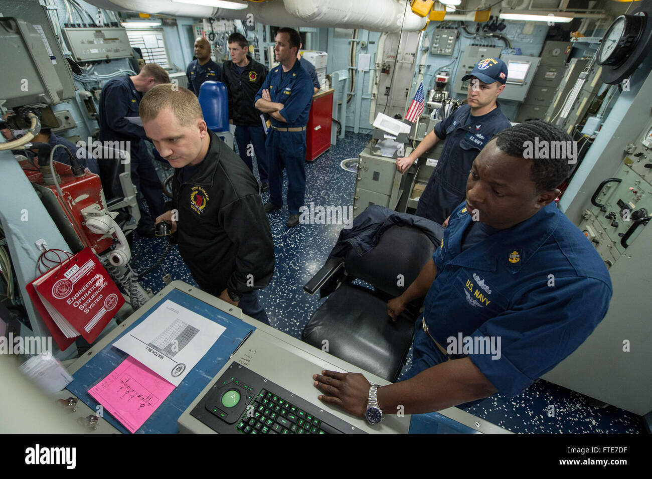 Sailors aboard the USS Ramage (DDG 61) monitor engine readings during a ...