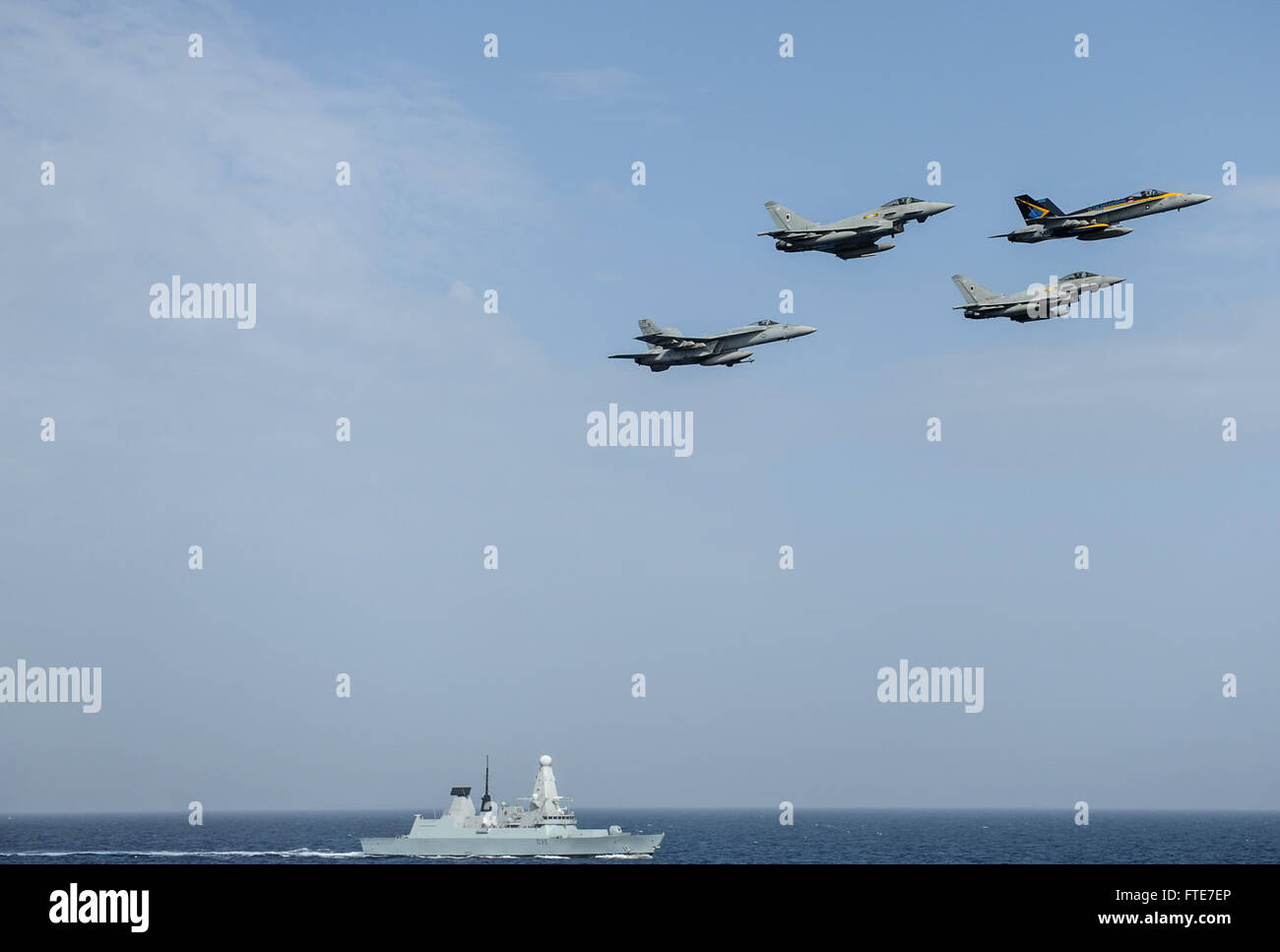 This image captures a joint flight operation between U.S. and British ...