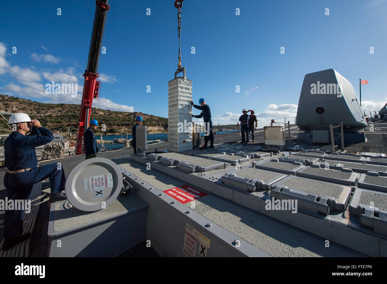 Sailors aboard the USS Ramage (DDG 61), an Arleigh Burke-class guided ...