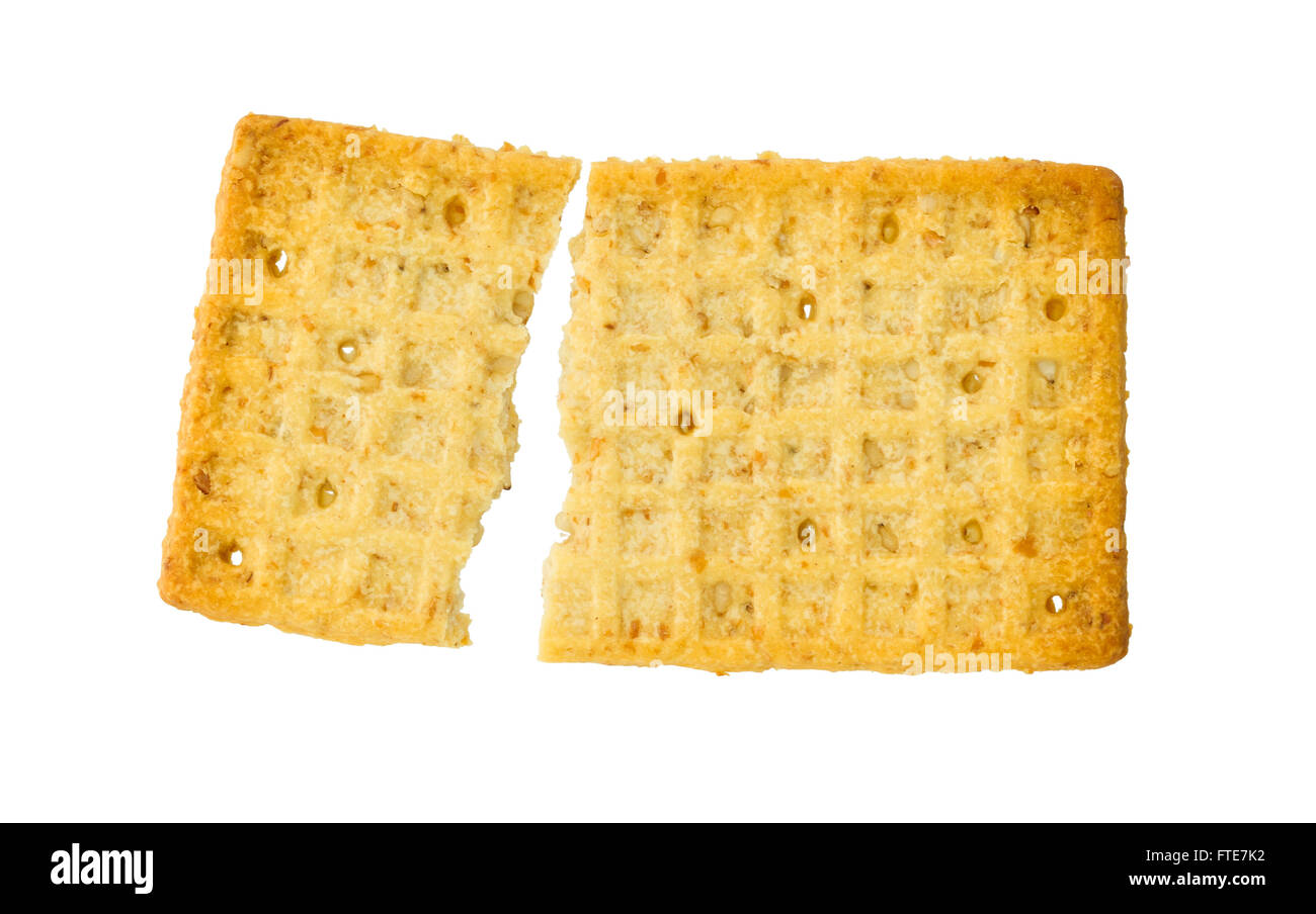 Broken cracker isolated on a white background Stock Photo - Alamy