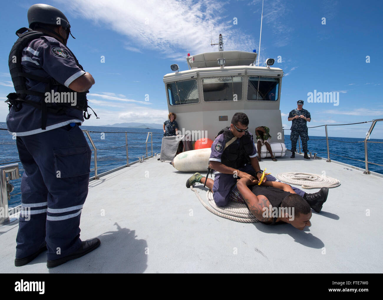The image captures a maritime counter-piracy operation during Exercise ...
