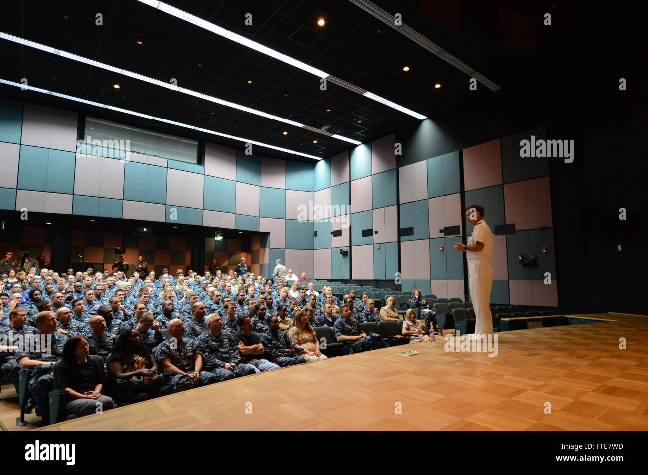 Adm. Mark Ferguson addresses U.S. Navy sailors during an all-hands call ...