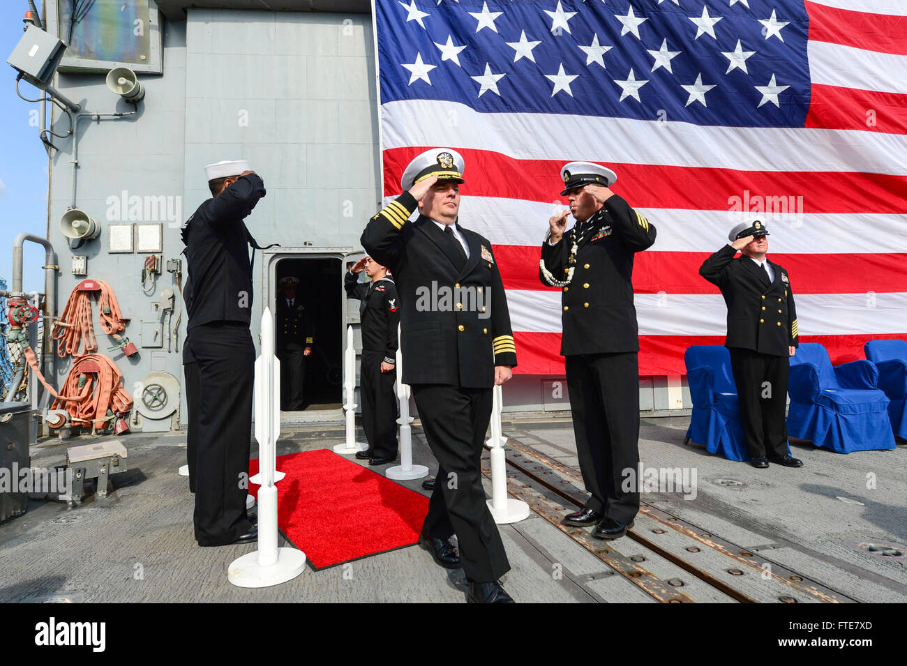Capt. Richard Cheeseman takes command of the USS Monterey during a ...