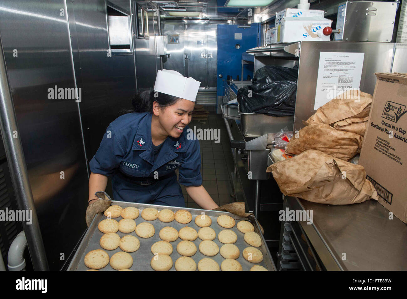 Engineman 2nd Class Cherrilyn Alonzo prepares Thanksgiving dinner ...
