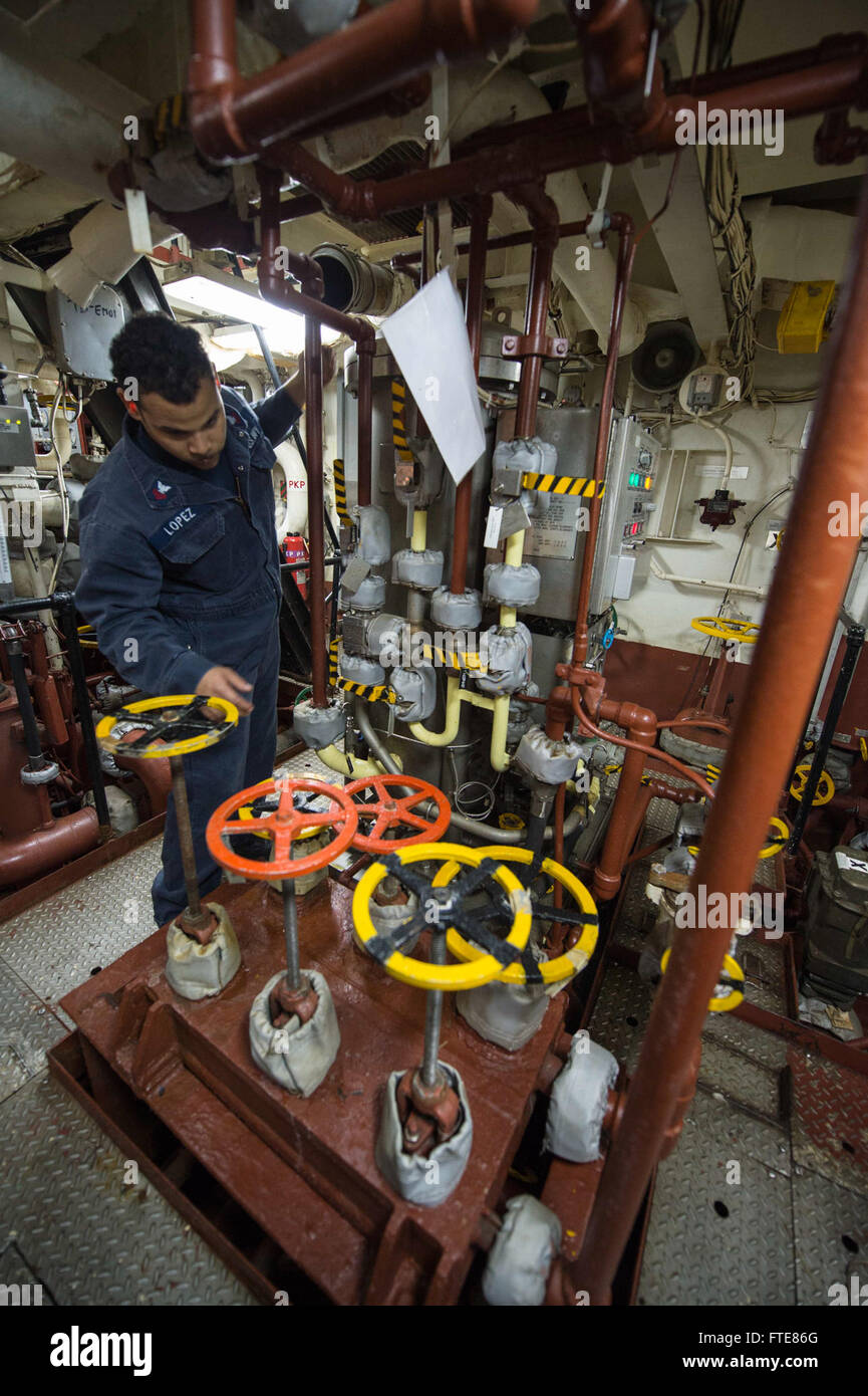 Gas Turbine System Technician 1st Class Ezekiel Lopez is shown ...