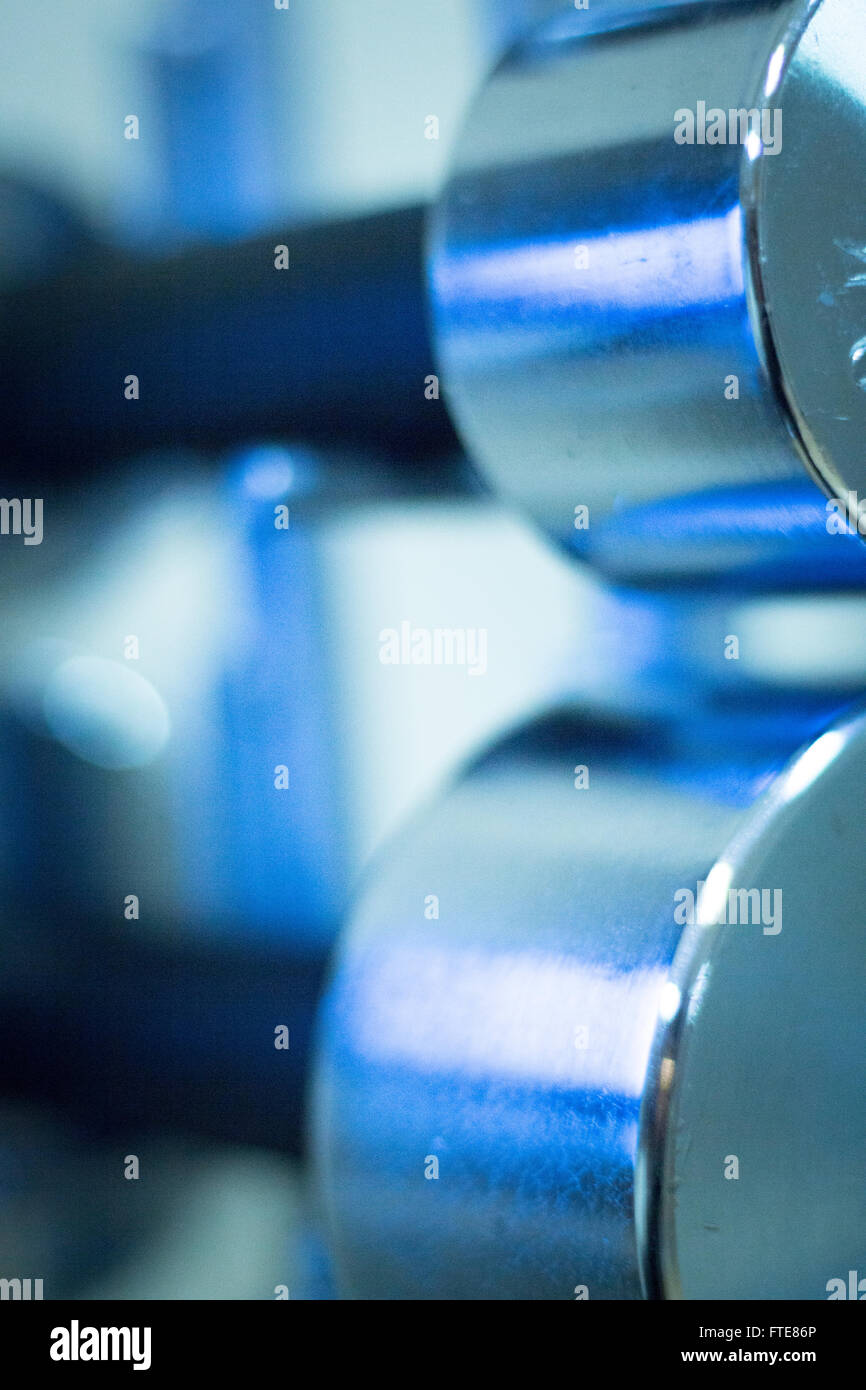 Chromed metal dumbells in crossfit, bodybuilding and weight training ...