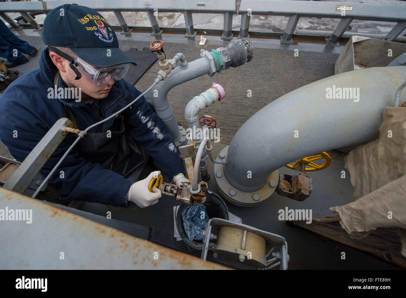 A U.S. Navy photo showing Electrician’s Mate 3rd Class Ariel Vasquez ...