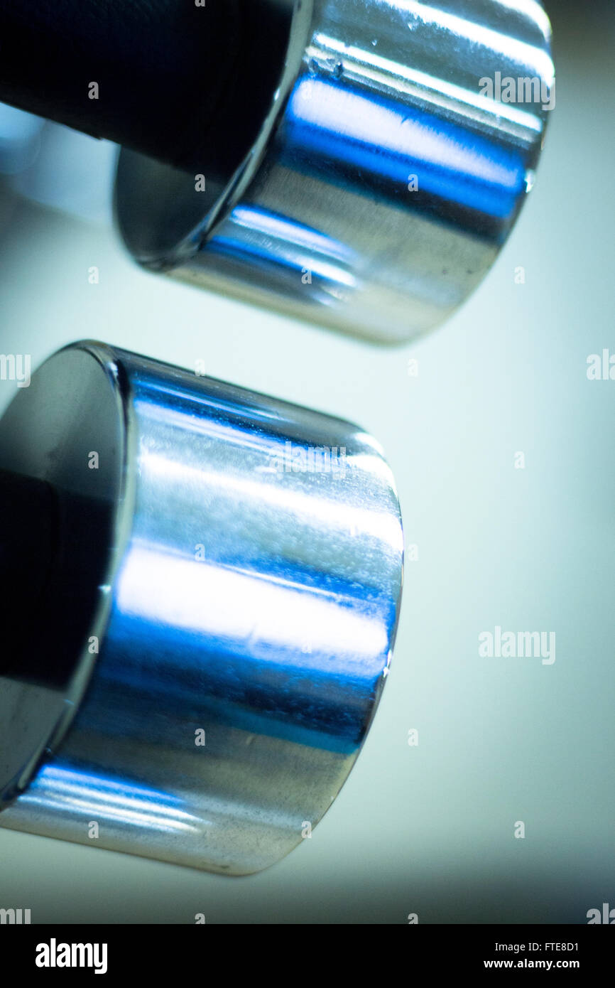 Chromed metal dumbells in crossfit, bodybuilding and weight training ...