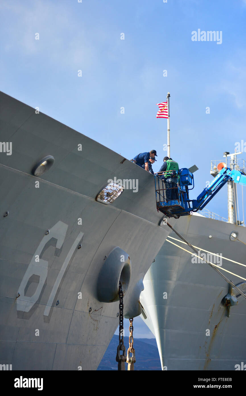 Sailors aboard the USS Monterey (CG 61) perform topside preservation ...