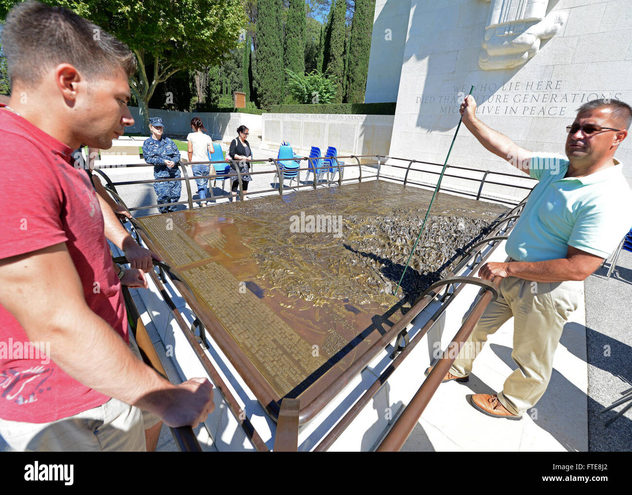 Sailors aboard the USS Mount Whitney visit the Rhone American Cemetery ...
