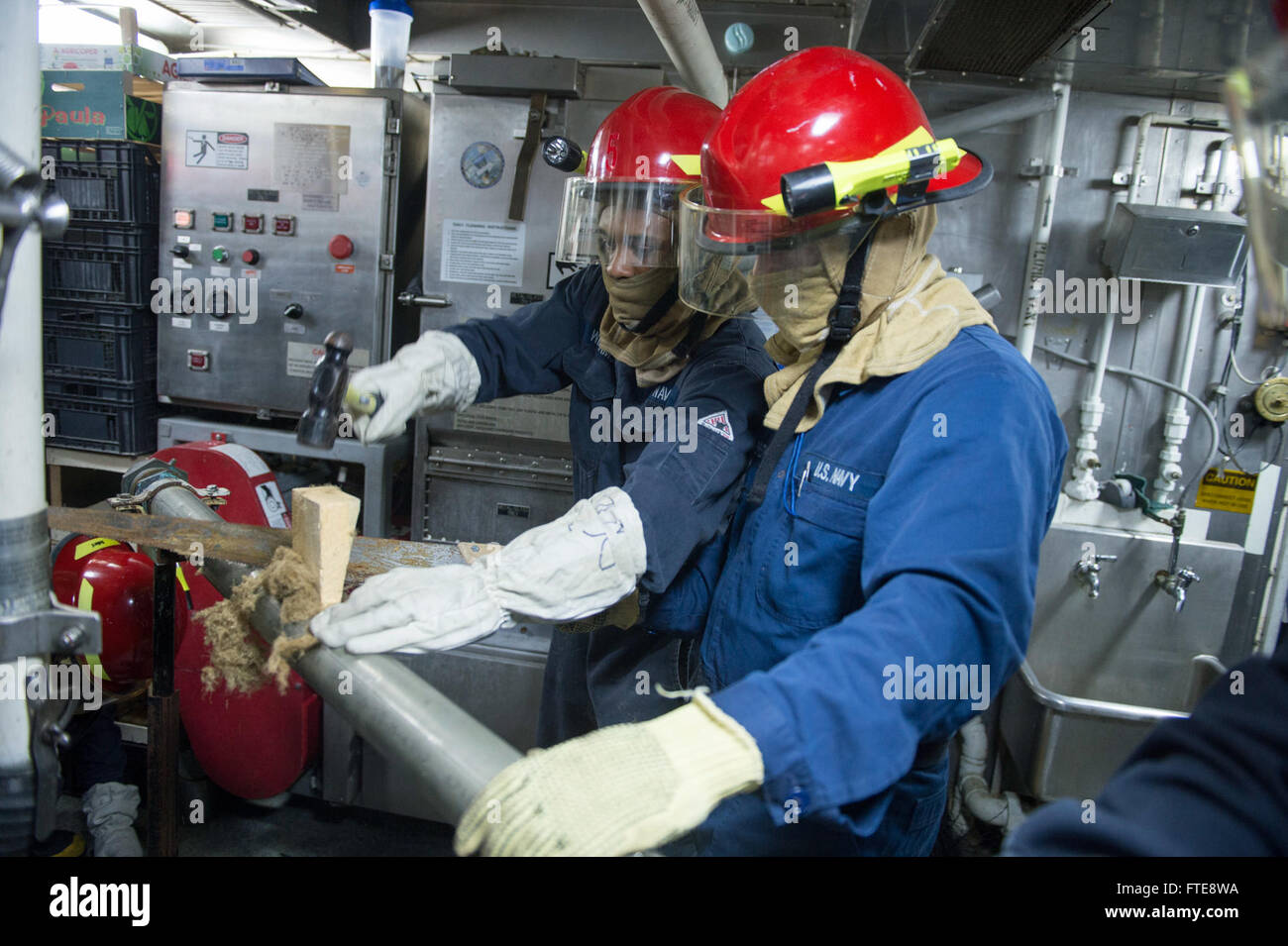 This image shows Damage Controlman 3rd Class Brandon Williams and Hull ...