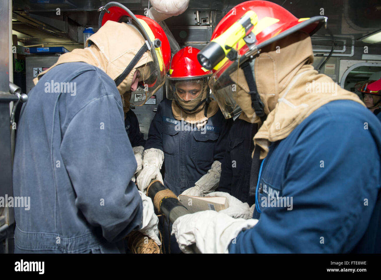 U s navy damage control fireman hi-res stock photography and images - Alamy